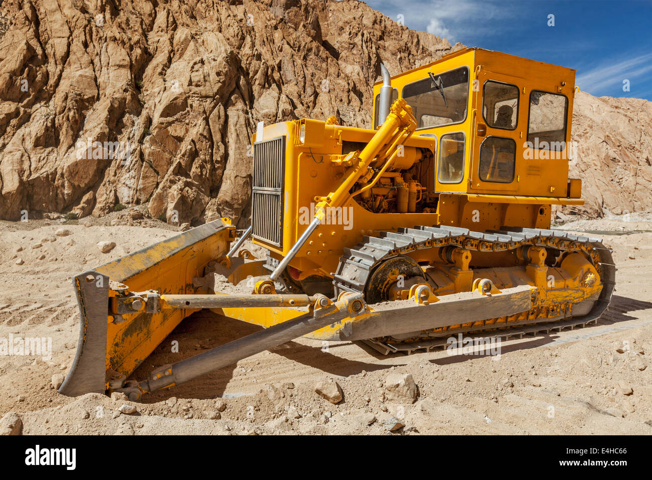Bulldozer doing road construction in Himalayas. Ladakh, Jammu and ...