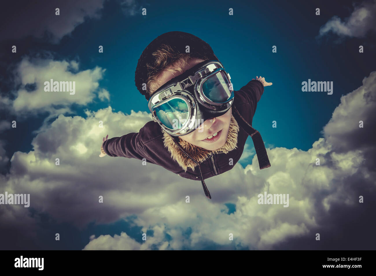 Fly, Boy flying, daydreaming he´s a pilot Stock Photo - Alamy