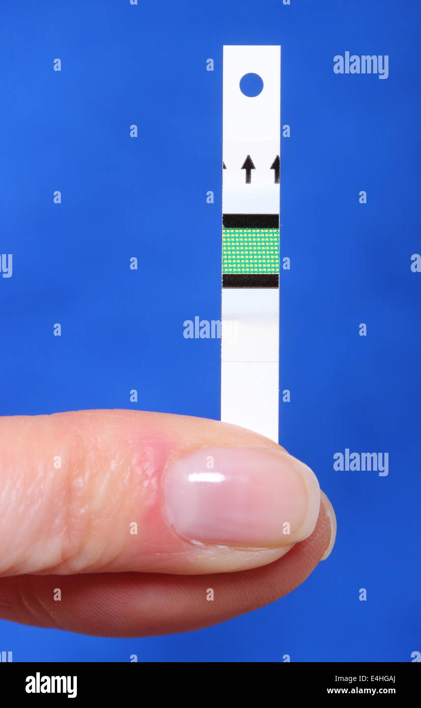 Closeup of strip for glucose testing, measuring sugar level. Isolated ...