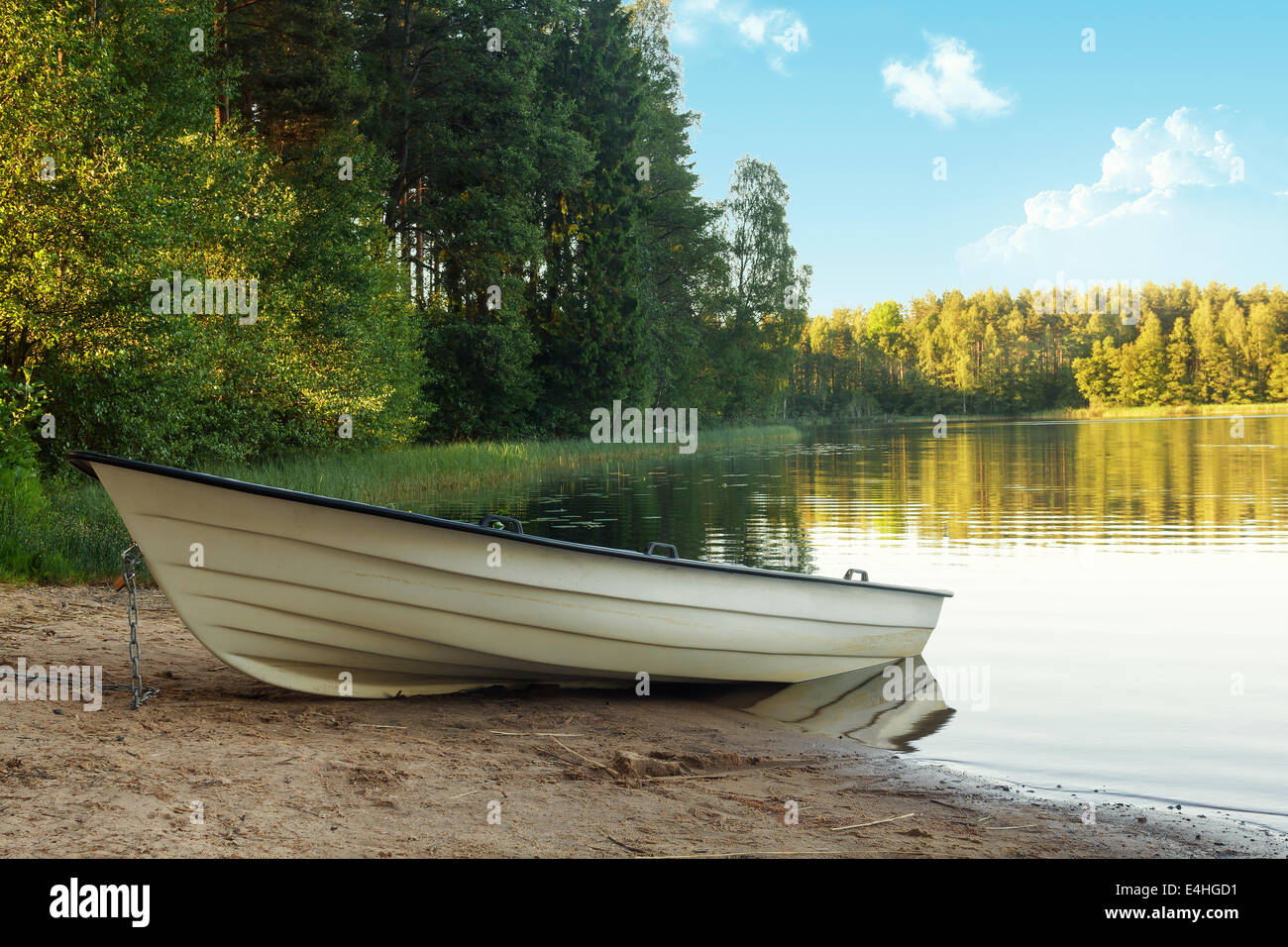 boat on the lake river landscape Stock Photo - Alamy