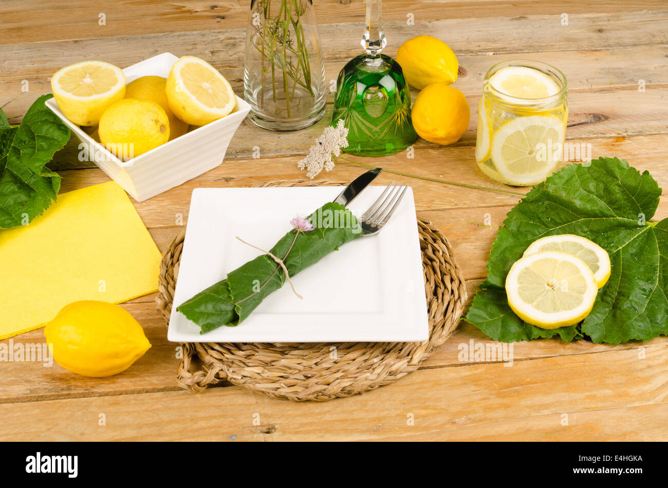 Still life of a rustic table set up in summery colors Stock Photo - Alamy