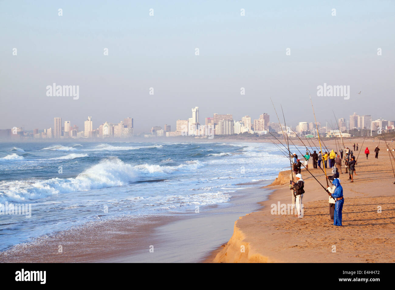 DURBAN, SOUTH AFRICA - JULY 2, 2014: Many unknown fisherman fish off ...