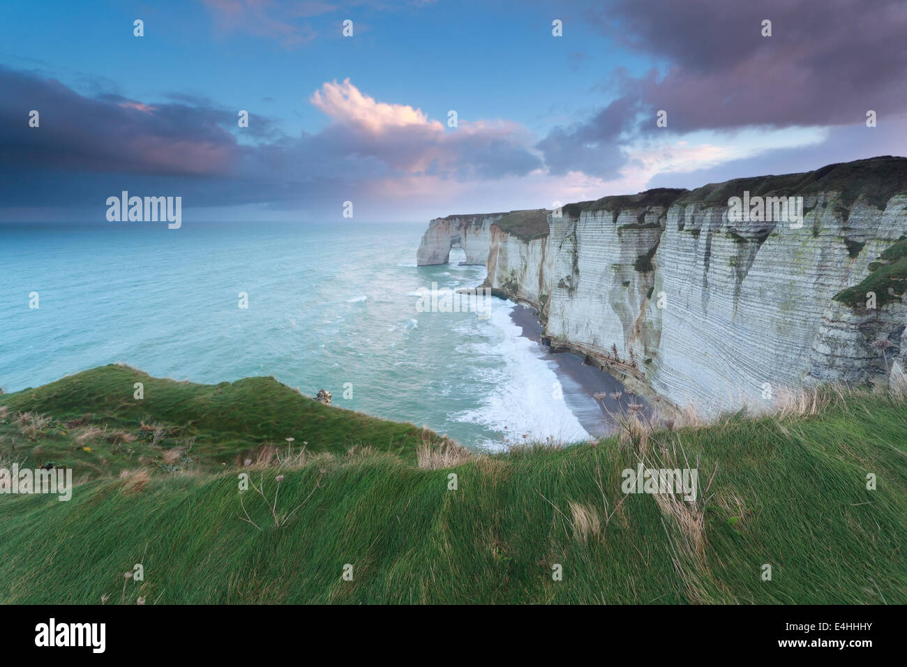 rocky cliffs in ocean at sunrise, Etretat, France Stock Photo - Alamy