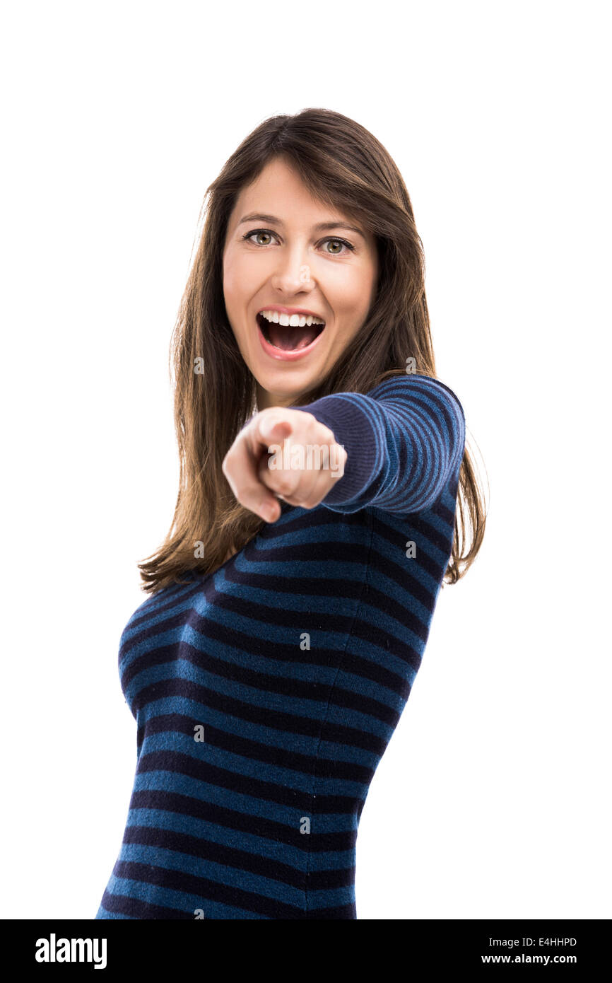 Beautiful woman pointing to the camera, isolated over a white ...
