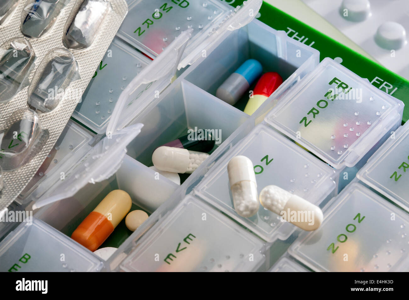 Pills and Tablets in Treatment Routine Box Stock Photo - Alamy