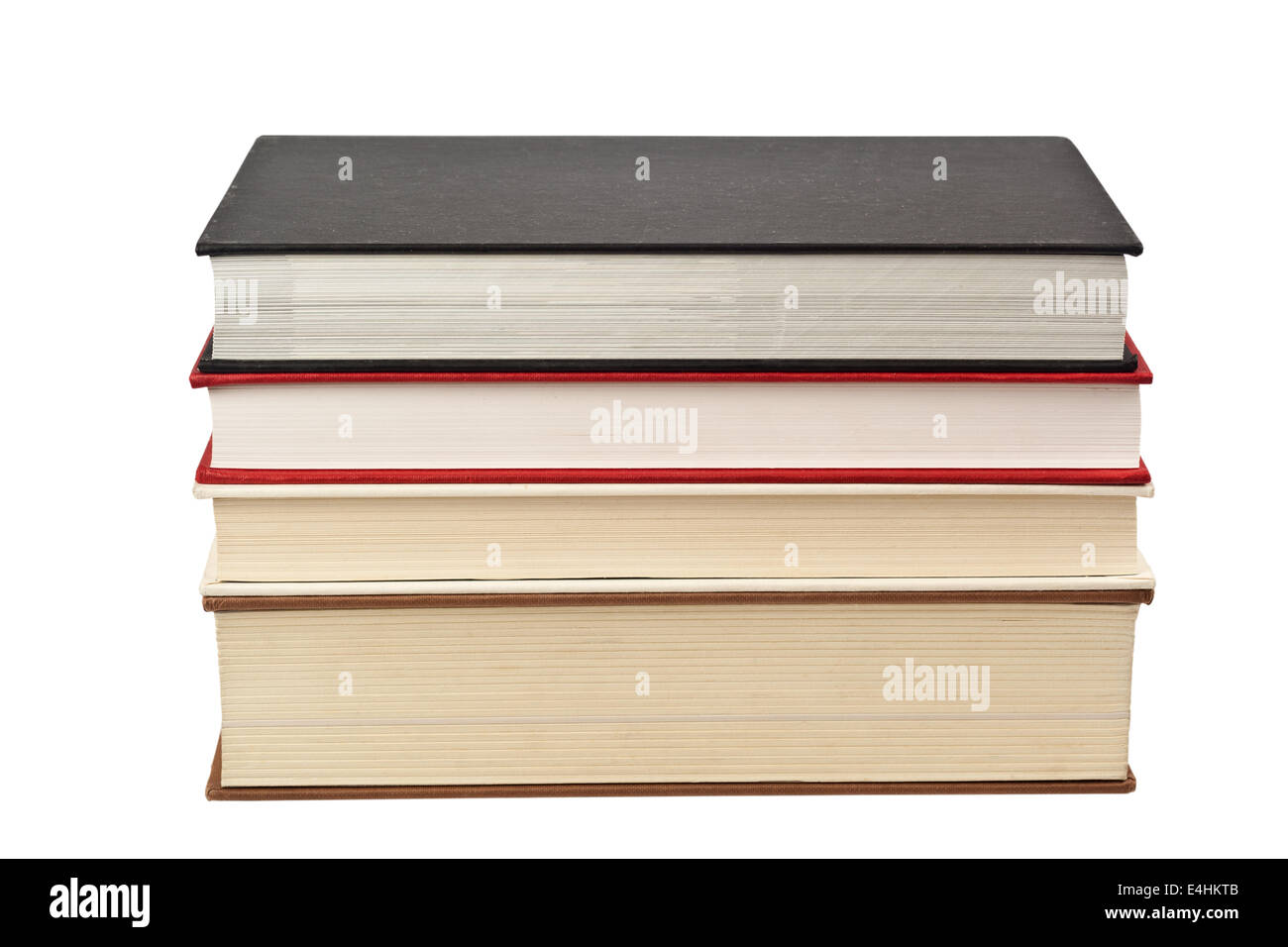 Closeup of a stack of four books isolated on white background Stock ...