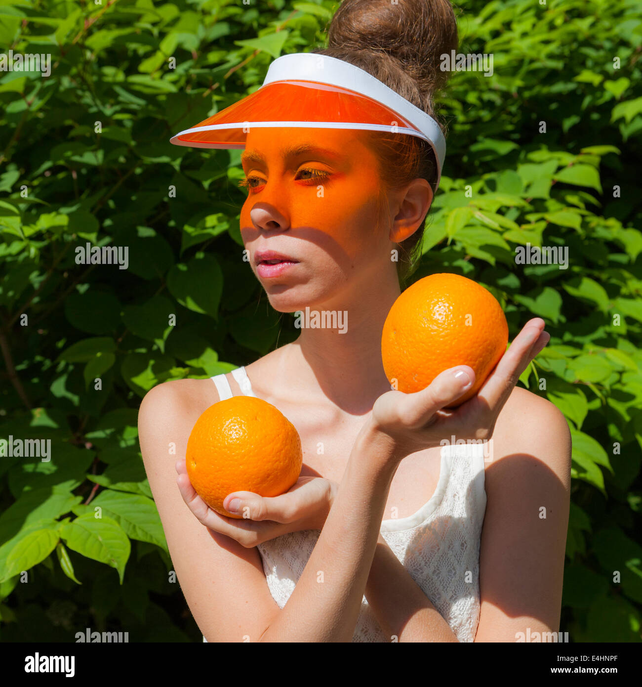 Woman summer orange fruit hi-res stock photography and images - Alamy
