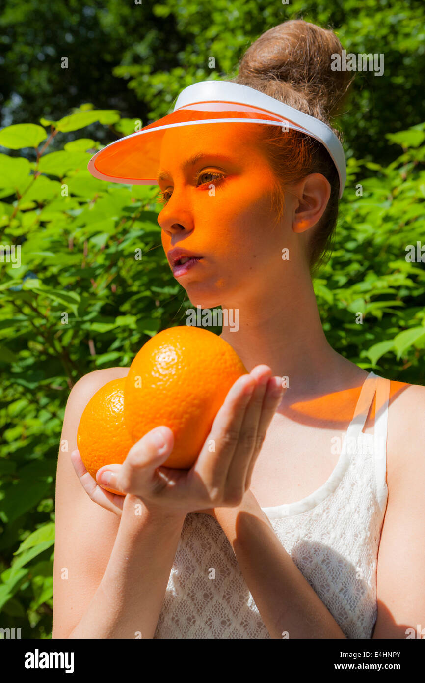 Woman summer orange fruit hi-res stock photography and images - Alamy