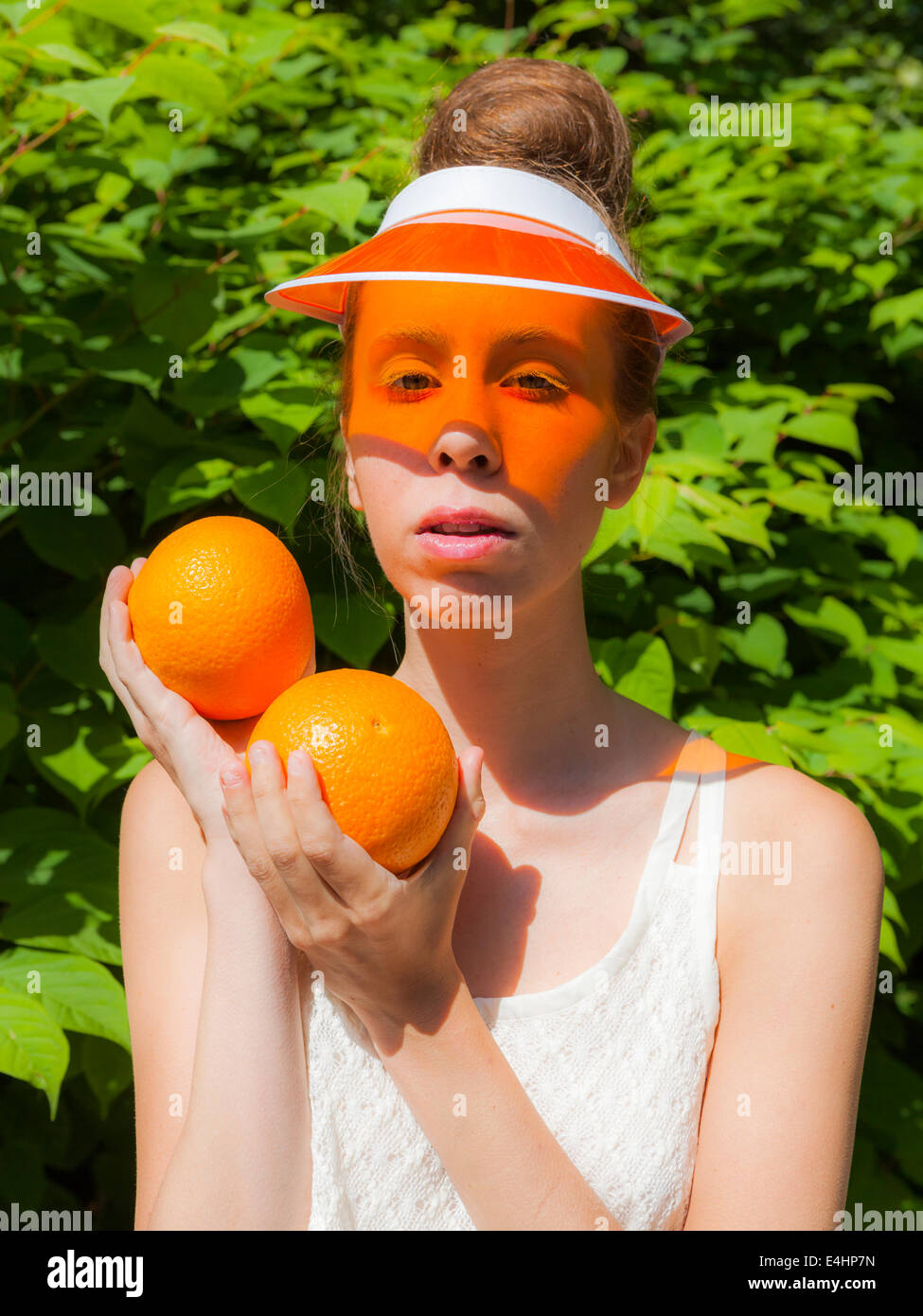 Woman summer orange fruit hi-res stock photography and images - Alamy