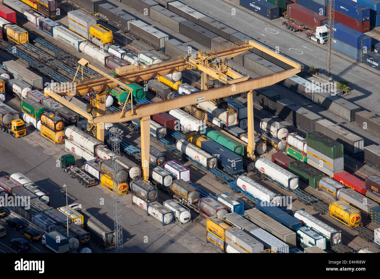 Overhead crane, containers, cisterns in Port of Barcelona in Catalonia ...