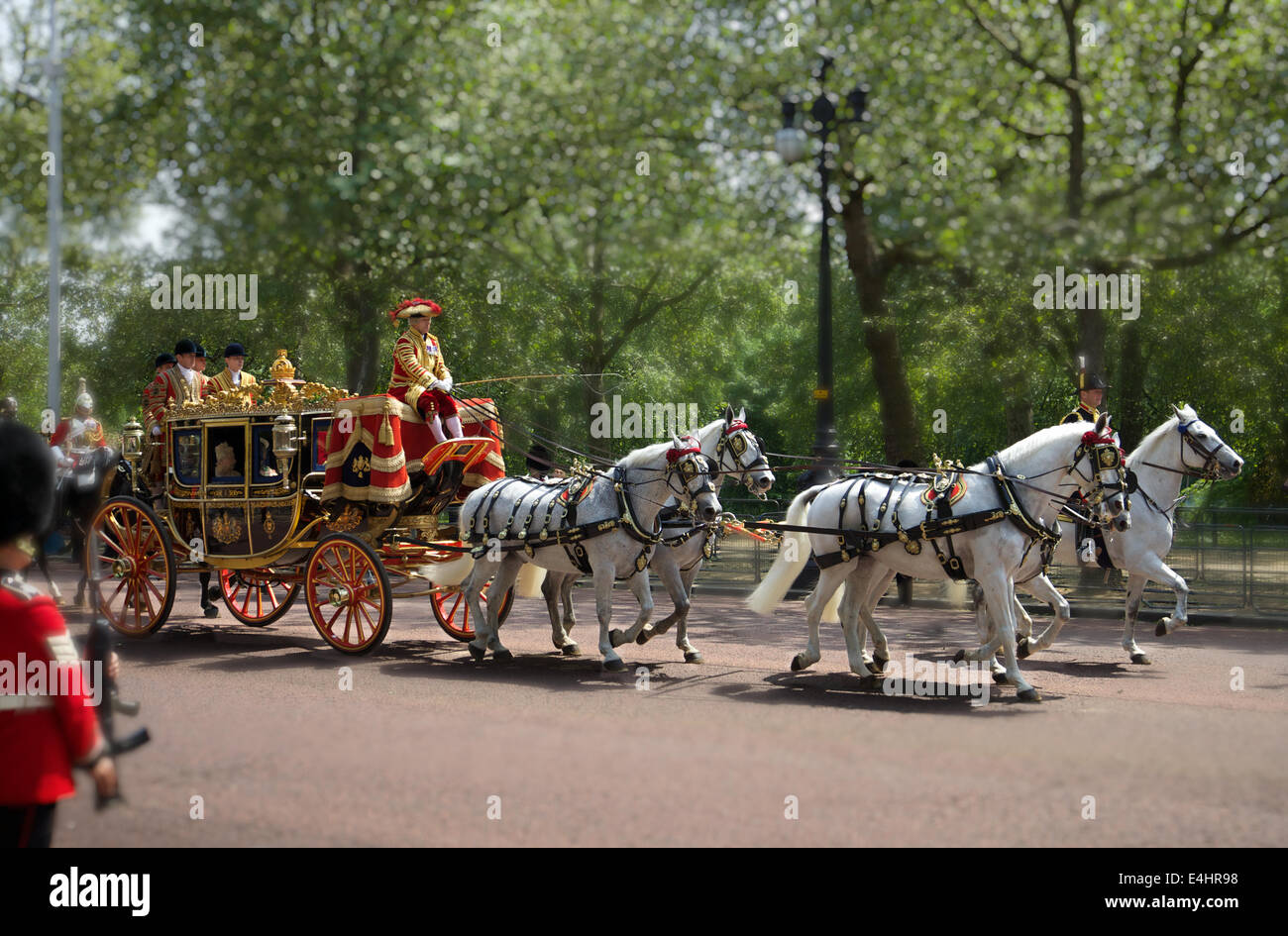 The Royal coach with Queen Elizabeth 11 and Prince Phillip on the way ...