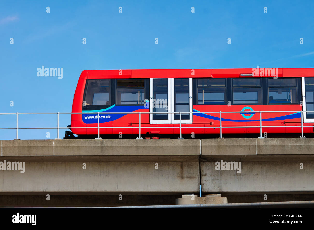 Docklands Light Railway train seen from below Stock Photo - Alamy