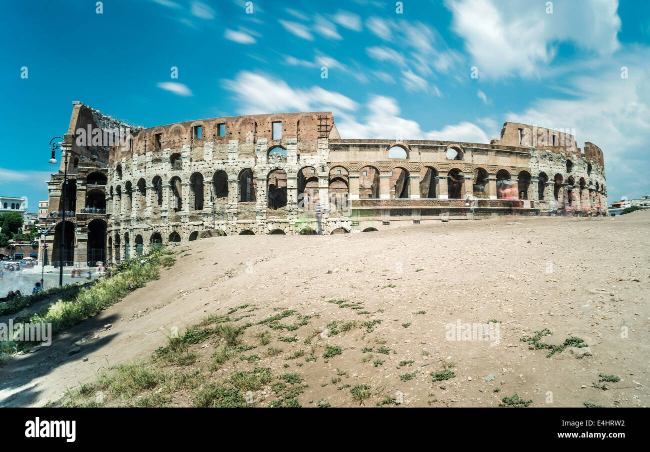 The Colosseum in Rome. Blue sky Stock Photo - Alamy