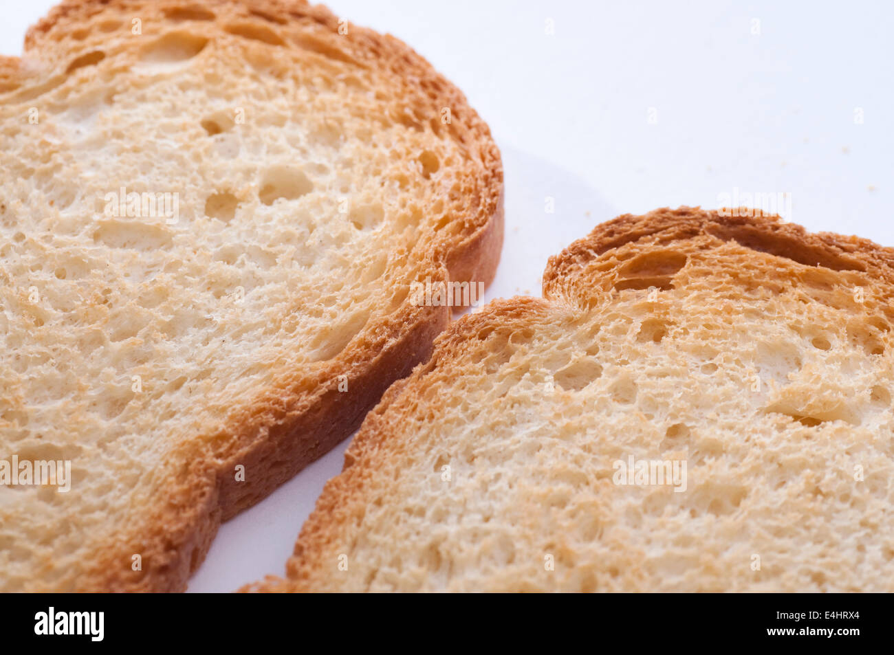 piece of toast picture over white background Stock Photo - Alamy