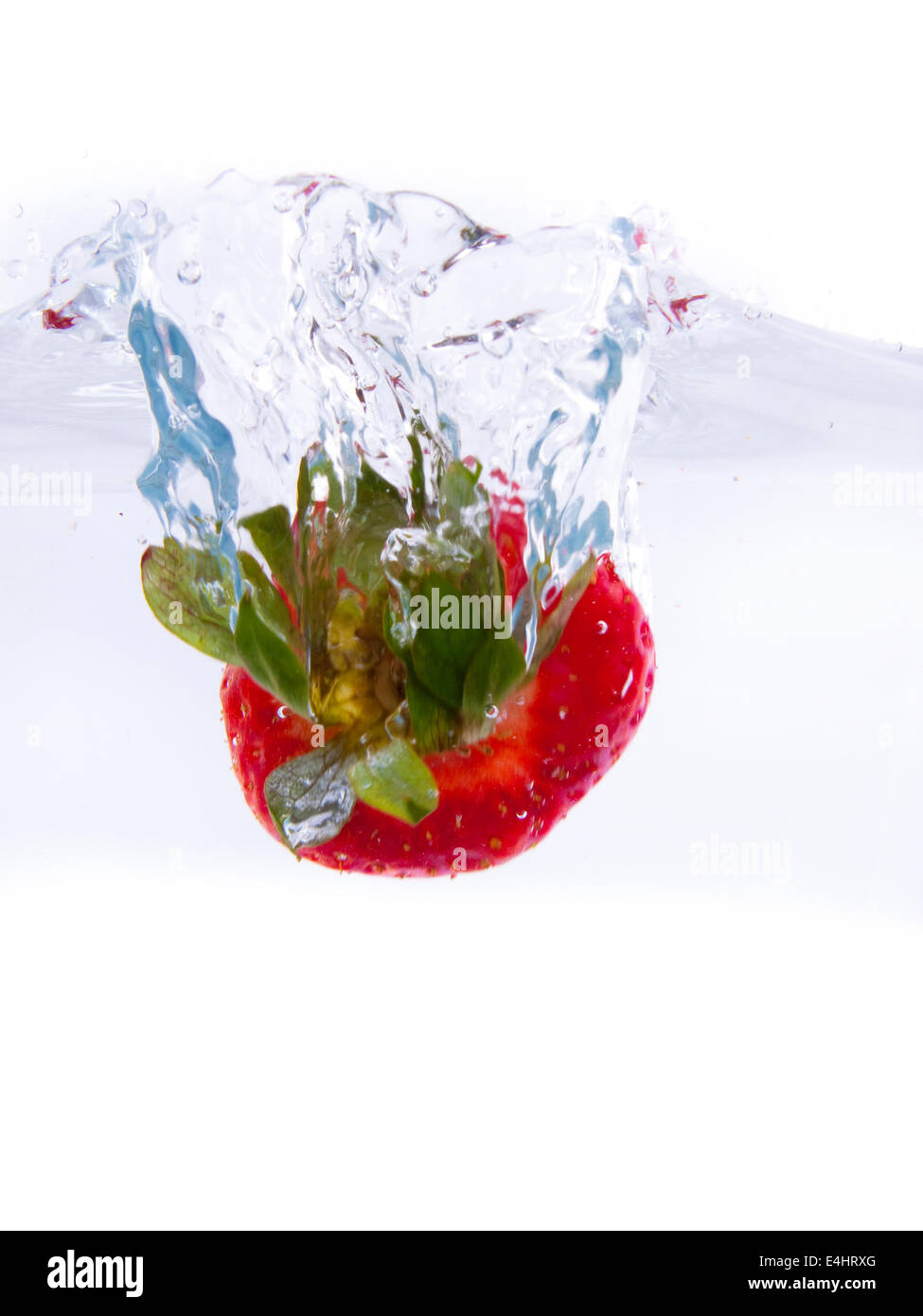 Fruits falling into the water Stock Photo - Alamy