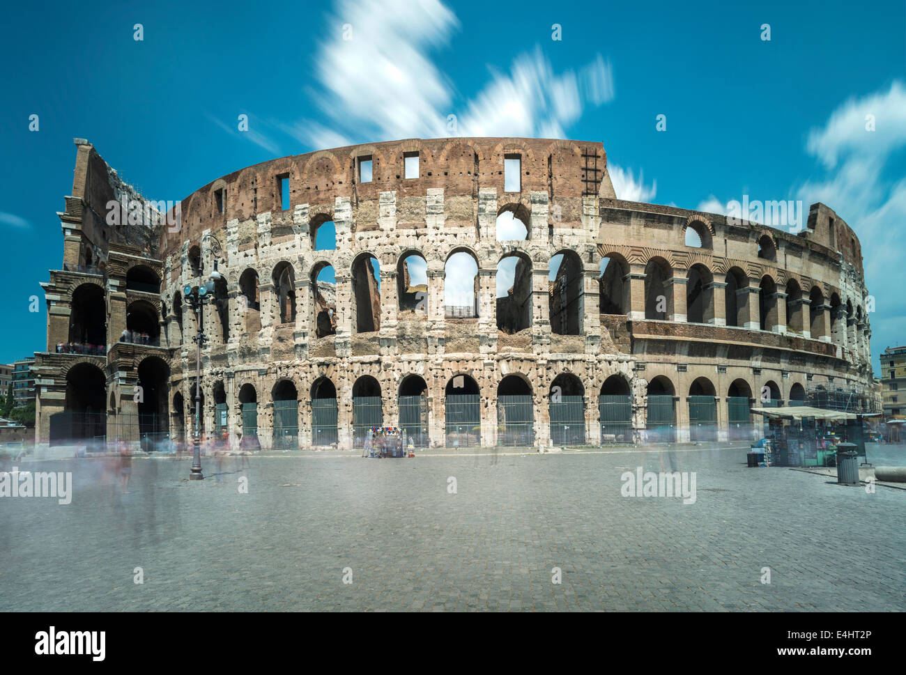 The Colosseum in Rome. Blue sky Stock Photo - Alamy