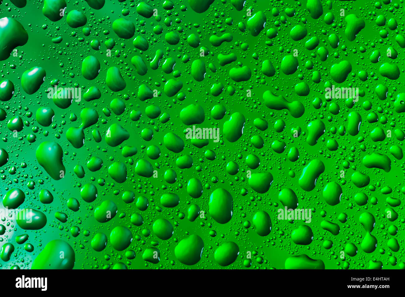 green water drops on the surface Stock Photo - Alamy