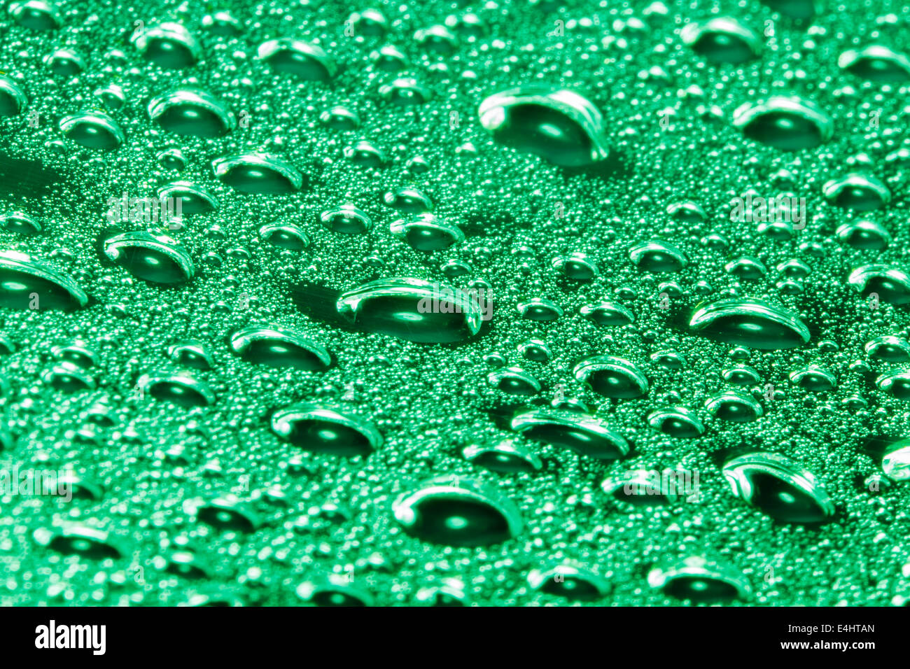 green water drops on the surface Stock Photo - Alamy