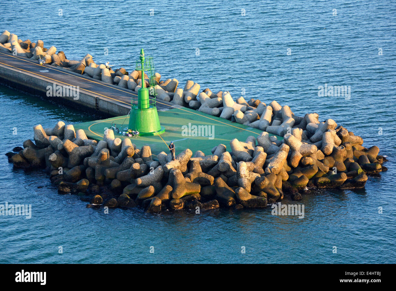 Dolosse type concrete blocks sea defences protect green channel marker ...