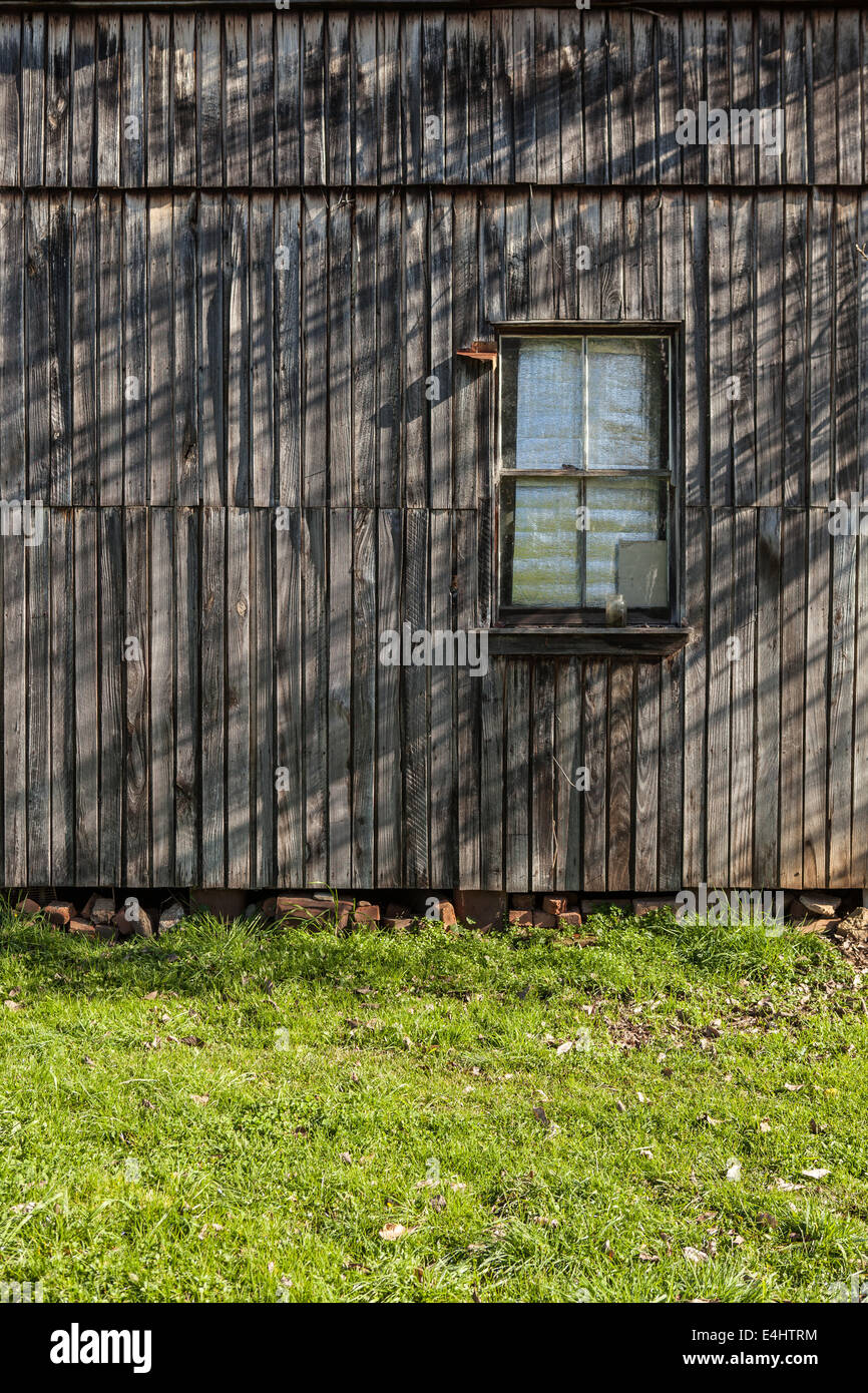 A rustic Australian county barn featuring a window and interesting ...
