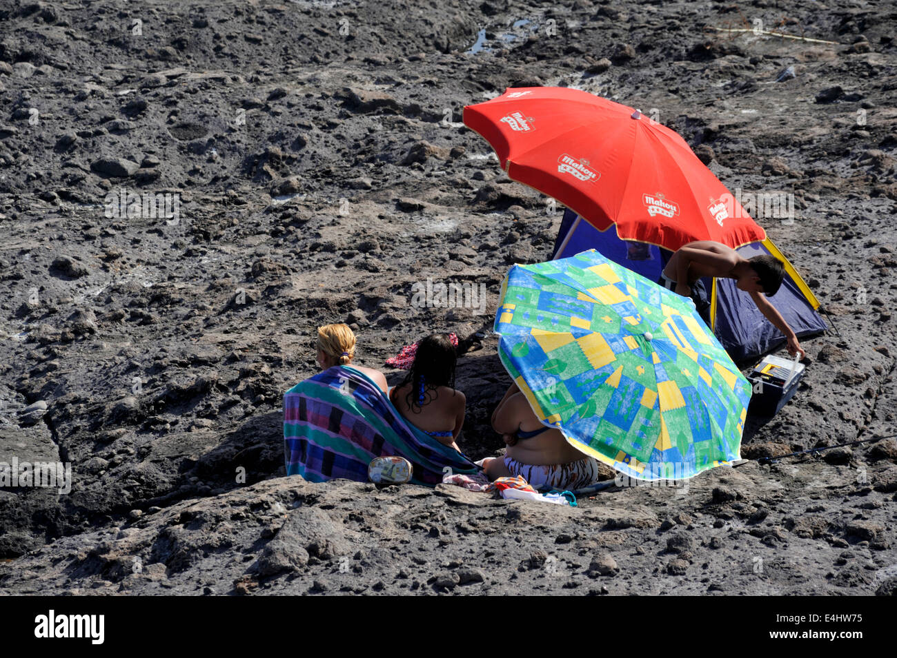 Sheltering from the sun hi-res stock photography and images - Alamy