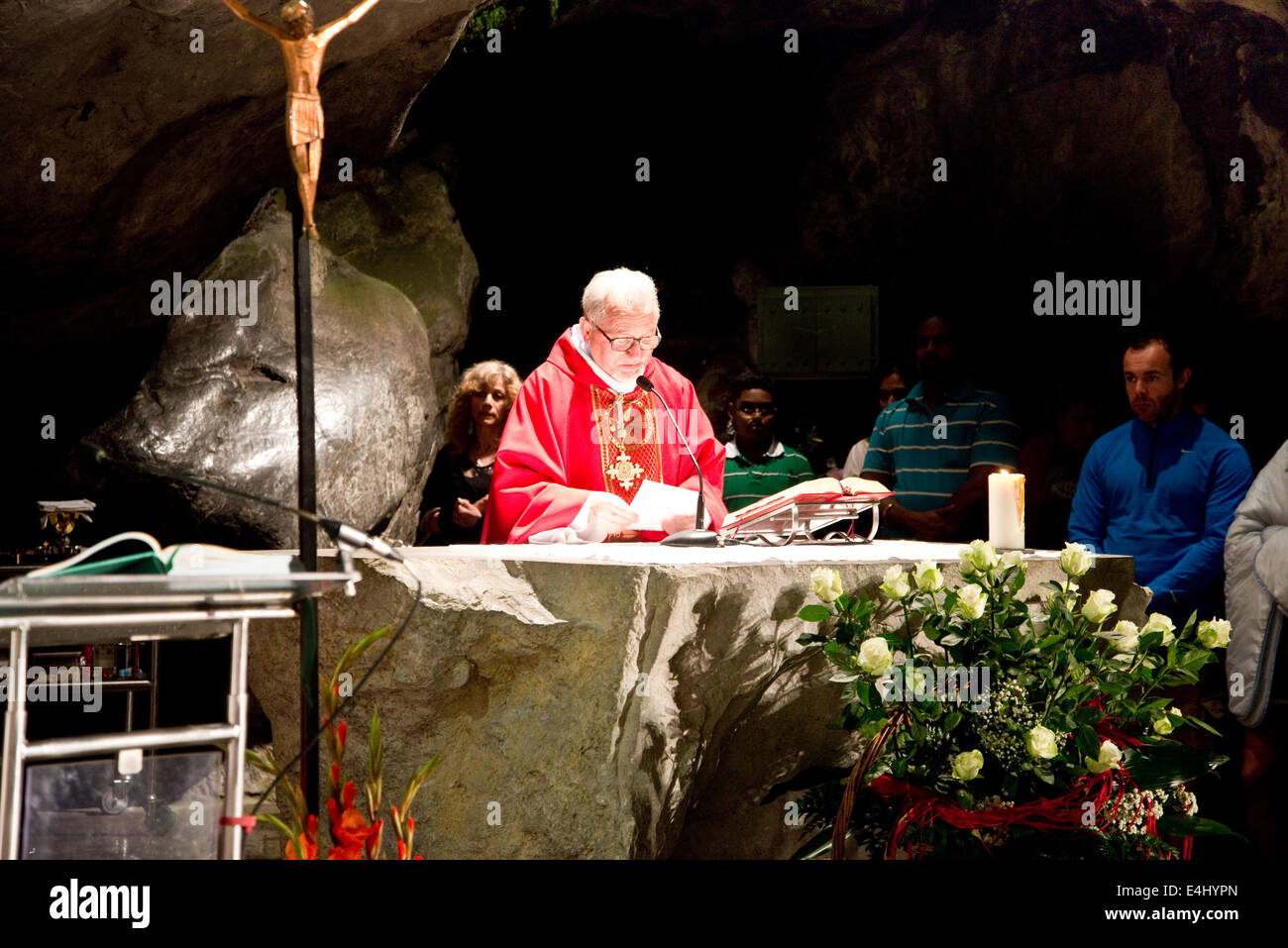 Statue of the Virgin Mary in the grotto of Lourdes Stock Photo - Alamy