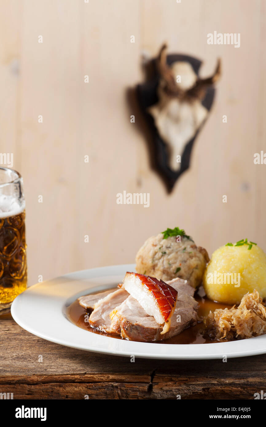 bavarian roasted pork with beer Stock Photo - Alamy