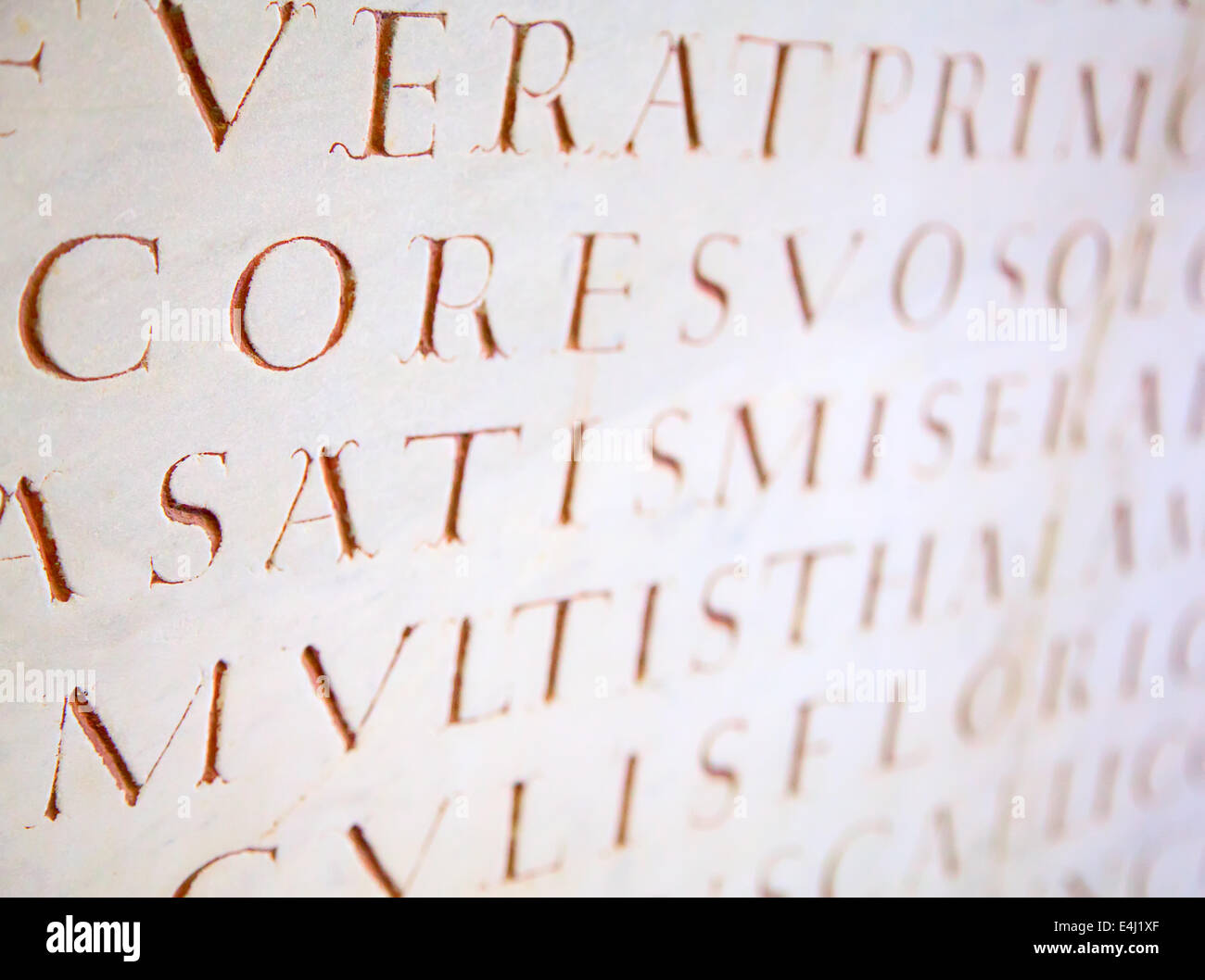 Pre-christian latin writing carved on the tombstone Stock Photo - Alamy