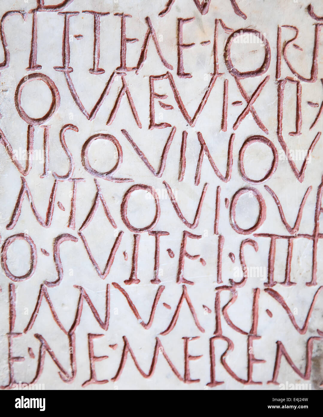 Pre-christian latin writing carved on the tombstone Stock Photo - Alamy