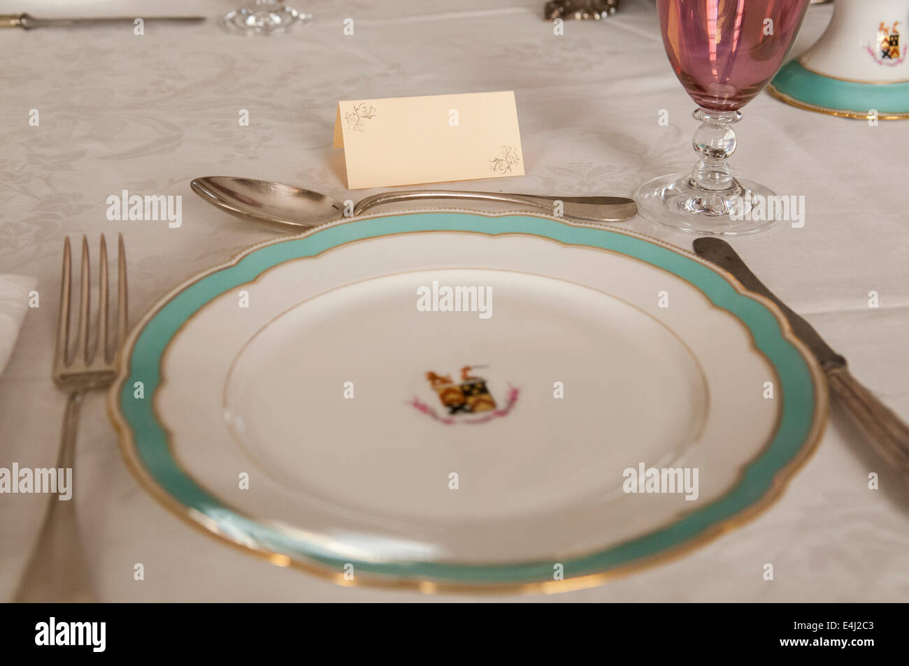 A place set for a formal dinner, with a blank name card Stock Photo - Alamy