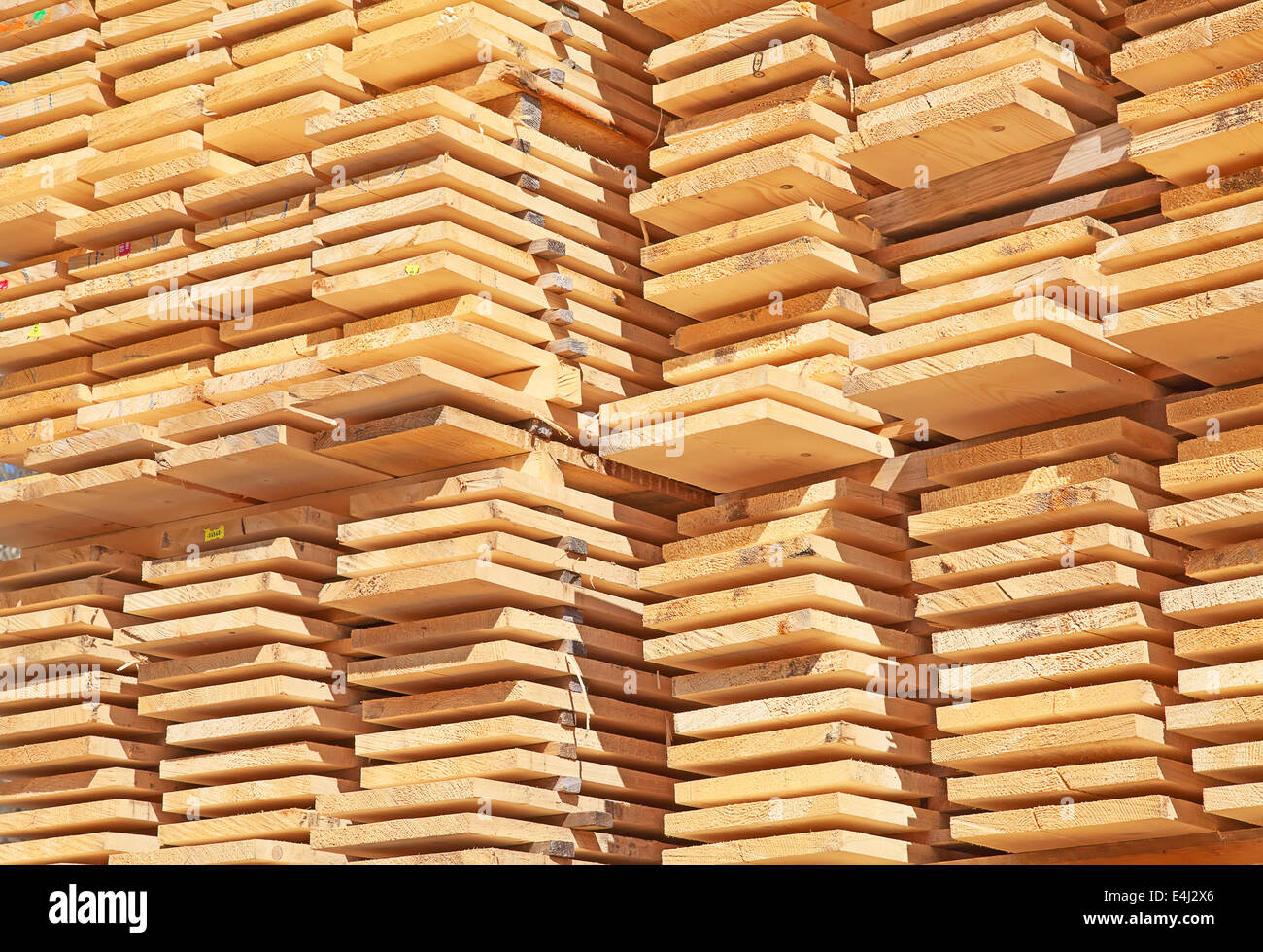 Stack of new wooden studs at the lumber yard Stock Photo - Alamy