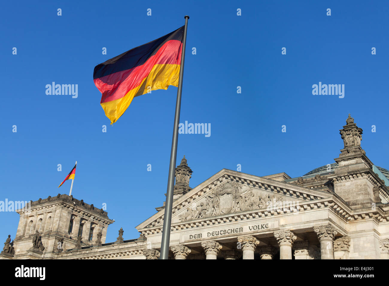 German flag reichstag flying hi-res stock photography and images - Alamy