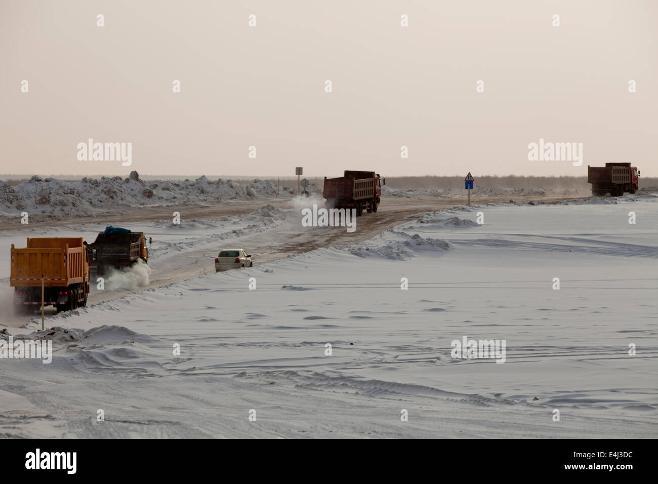 Russia road Trucks ice road snow frozen river Stock Photo - Alamy