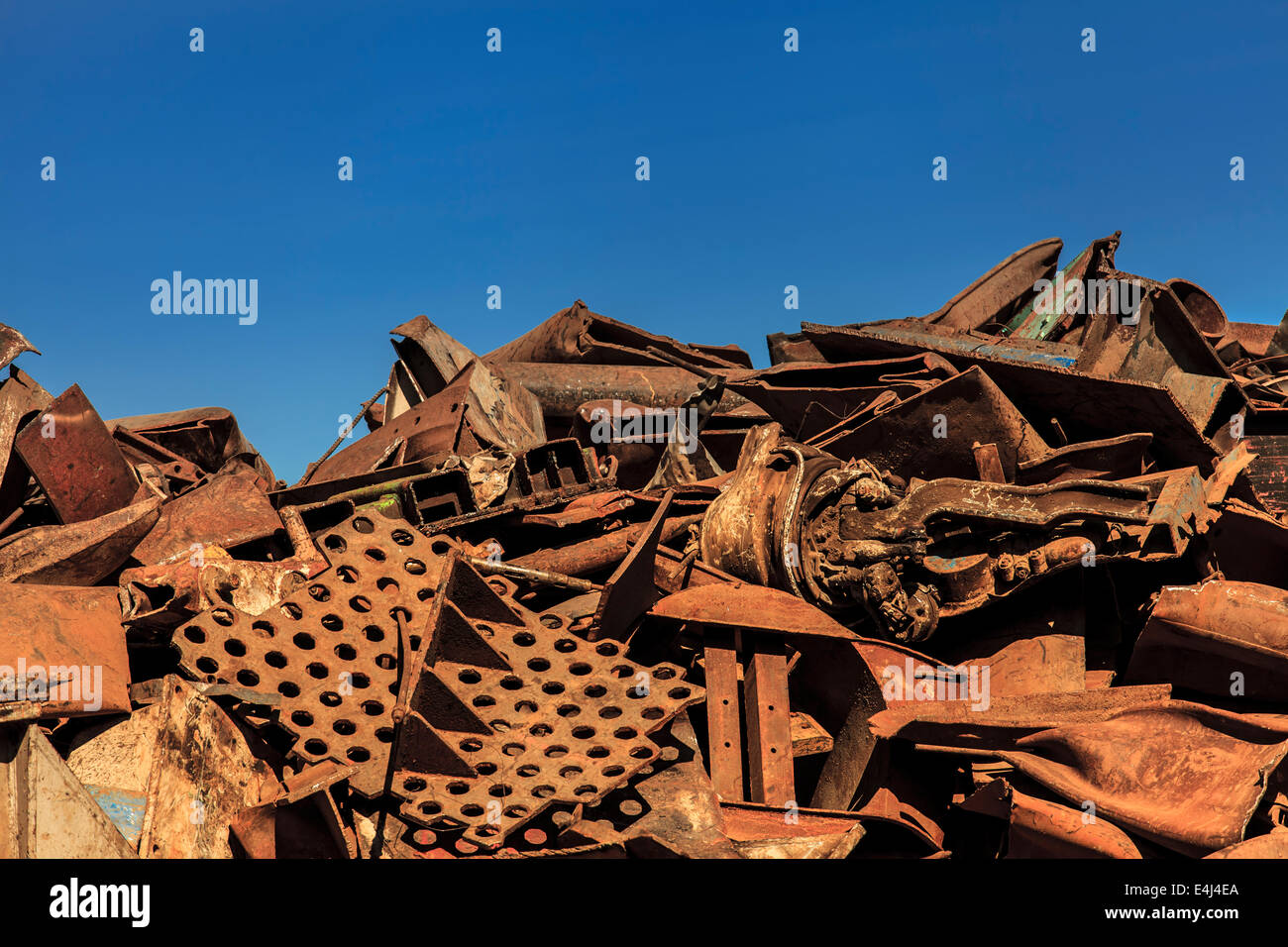 Scrap Metal Pile against a blue sky Stock Photo - Alamy