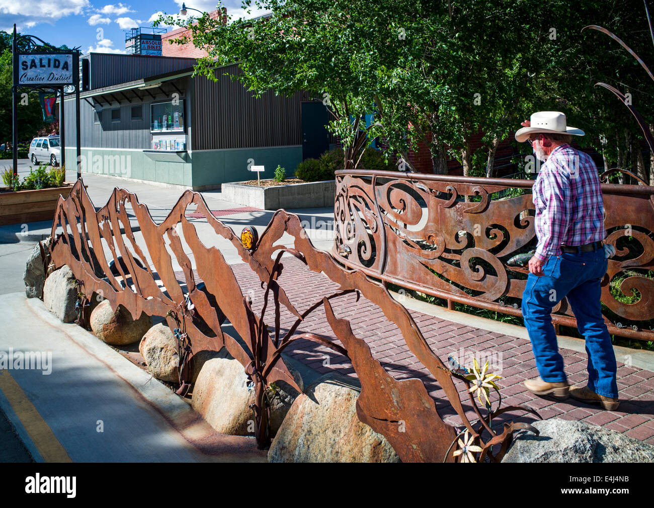 Visitor crosses “Nature’s Bridge”, concrete & steel sculpture created ...