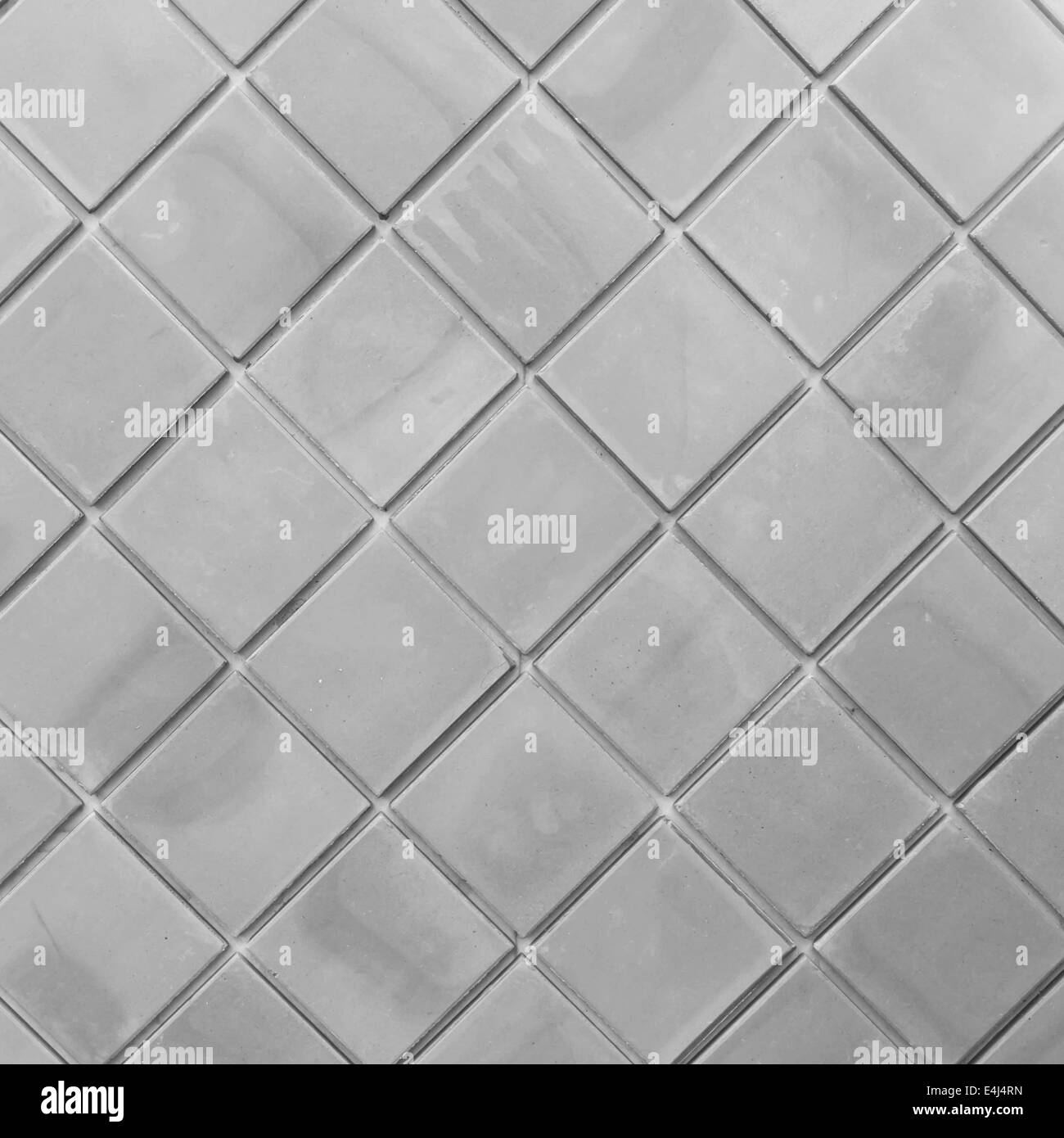 Gray wall tiles as a background or texture Stock Photo - Alamy