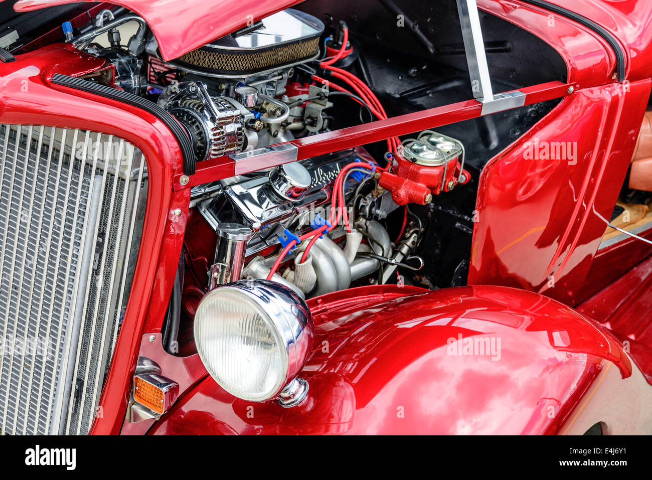 restored red antique Ford motor and grille Stock Photo - Alamy