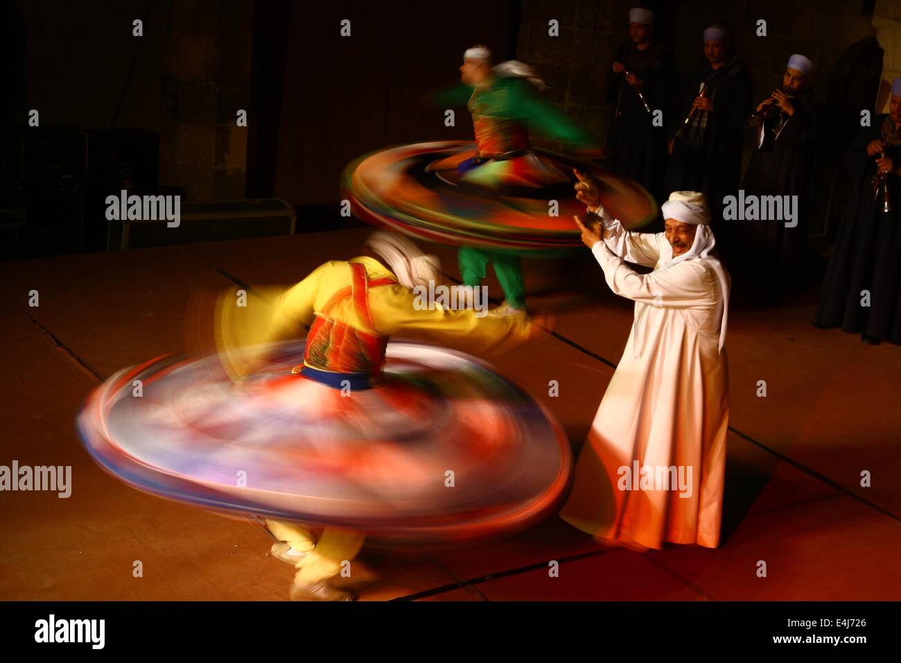 Cairo. 12th July, 2014. Egyptian dancers spin skirts "Al Tanoura ...