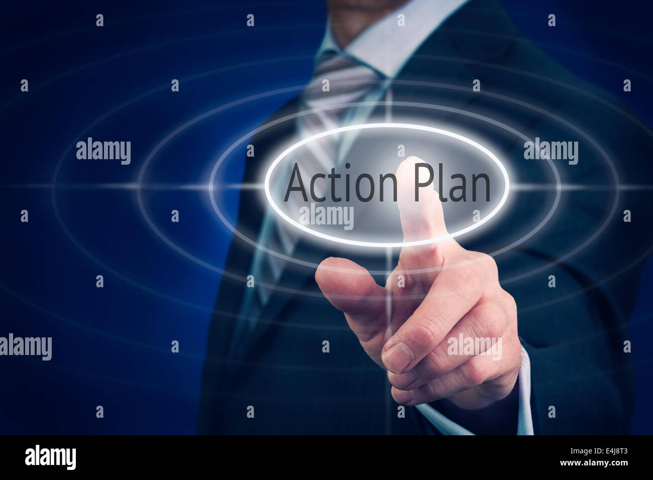 Businessman pressing an Action Plan concept button Stock Photo - Alamy