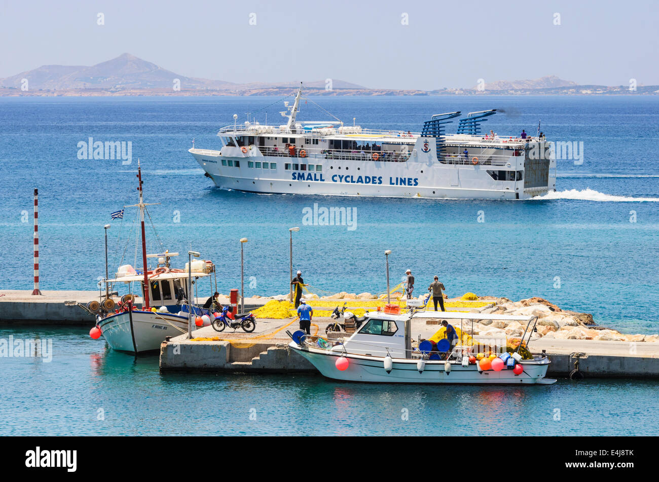 Fishing boats and Small Cyclades Lines ferry off the coast of Naxos ...