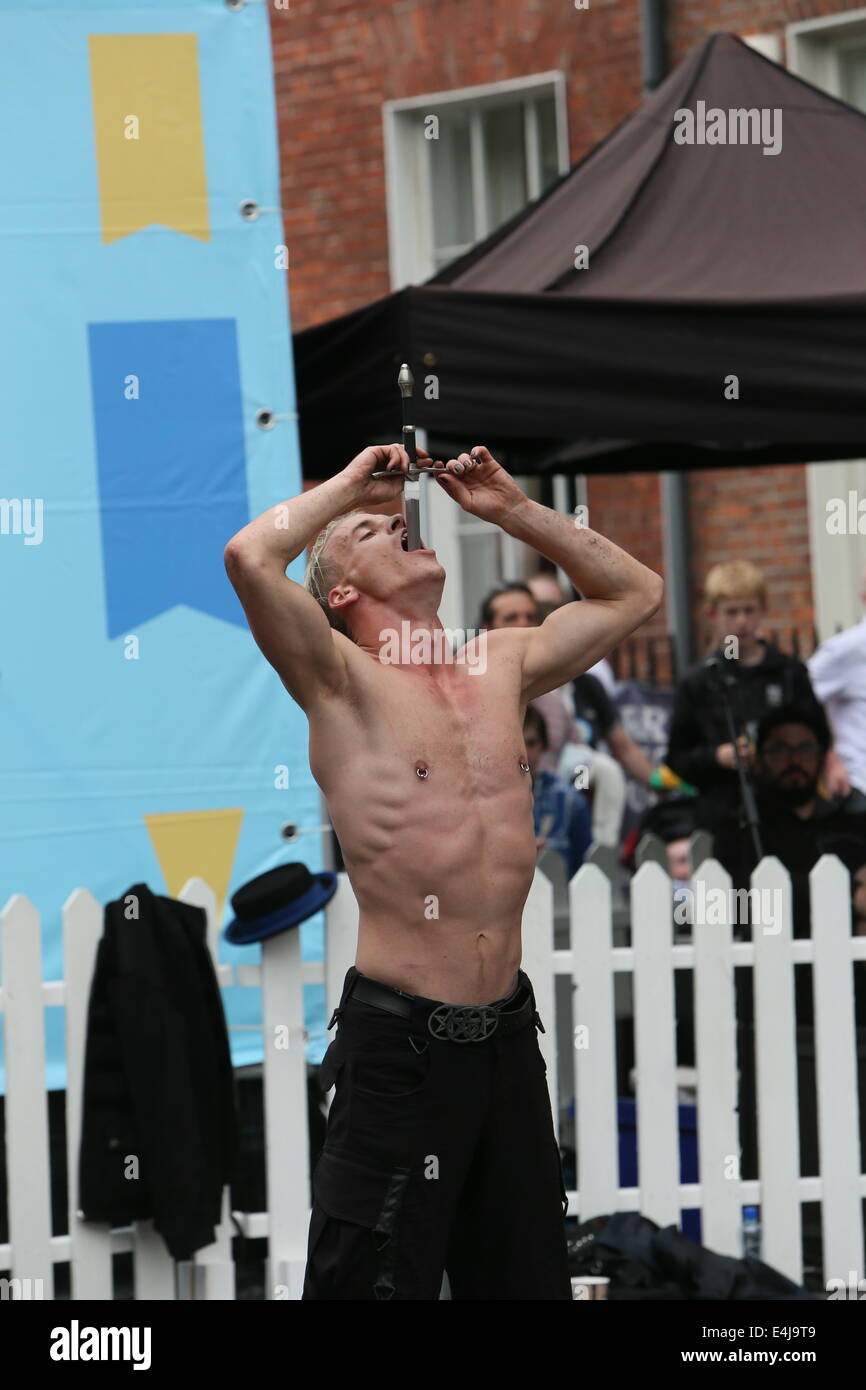 Aerial Manx performs his act including sword swallowing during the Laya ...