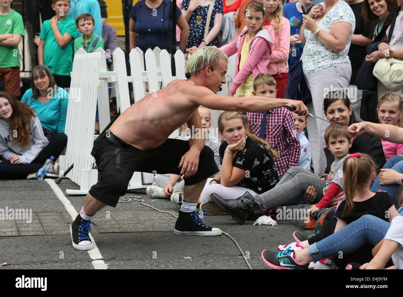 Aerial Manx performs his act including sword swallowing during the Laya ...