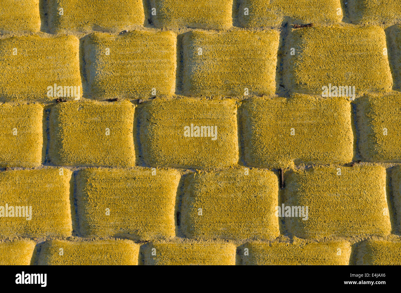 yellow painted cobblestone pavement Stock Photo - Alamy