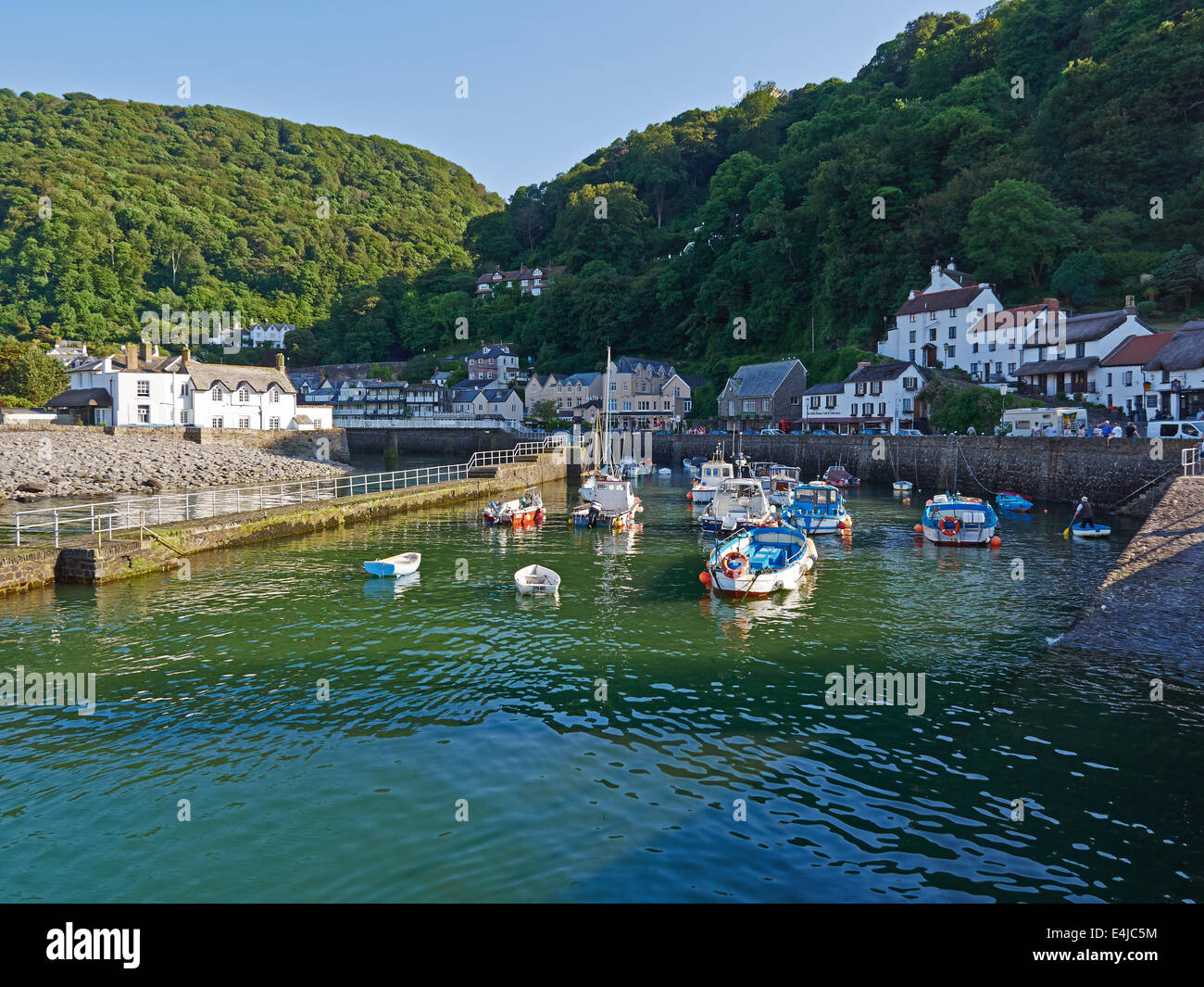 Lynmouth Harbour, Devon. Fishing boats bob on the incoming tide Stock ...