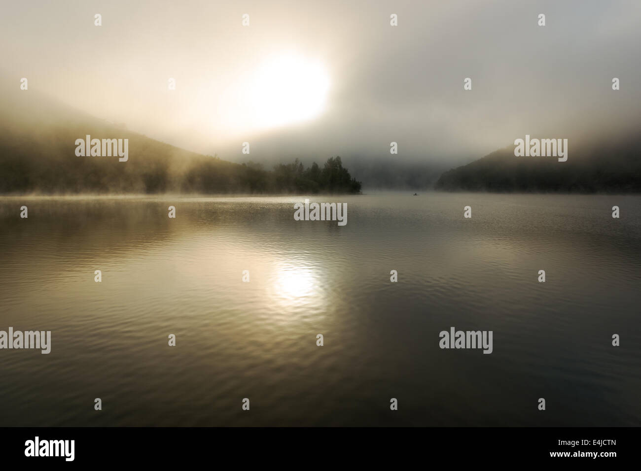 Spectacular deep fog over river at dawn Stock Photo - Alamy