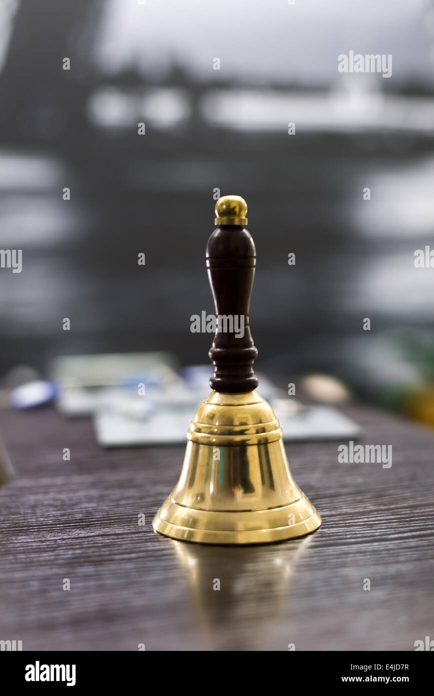 Bell on reception desk Stock Photo - Alamy
