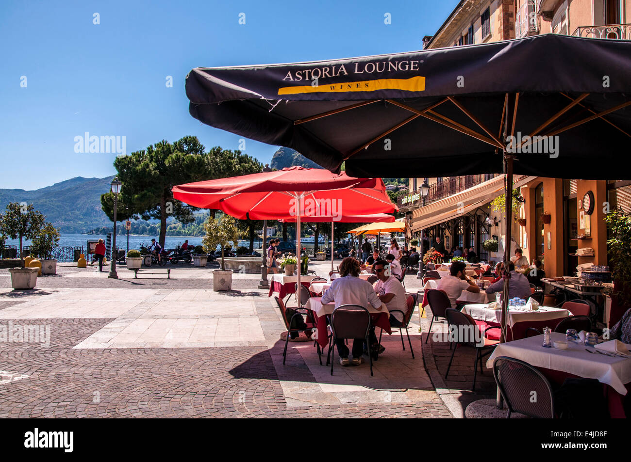 Menaggio on Lake Como Italy. Cafe and restaurant tables shades Stock ...