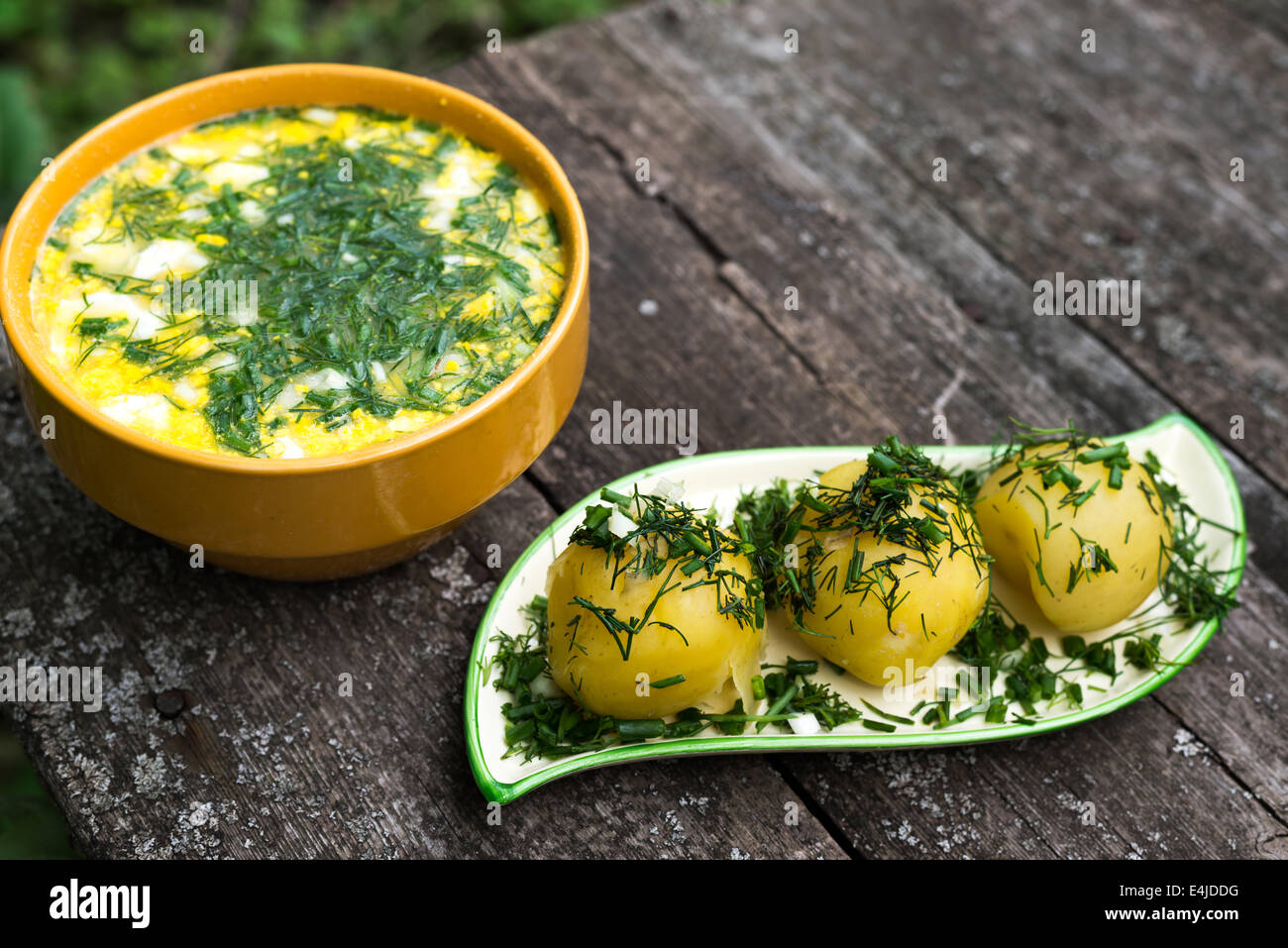 Russian national dish - Boiled potatoes and okroshka kvas Stock Photo ...