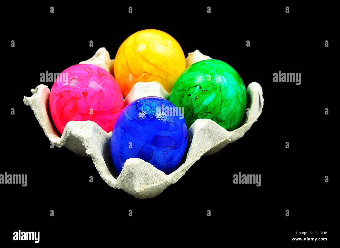 Four eggs in egg box hi-res stock photography and images - Alamy