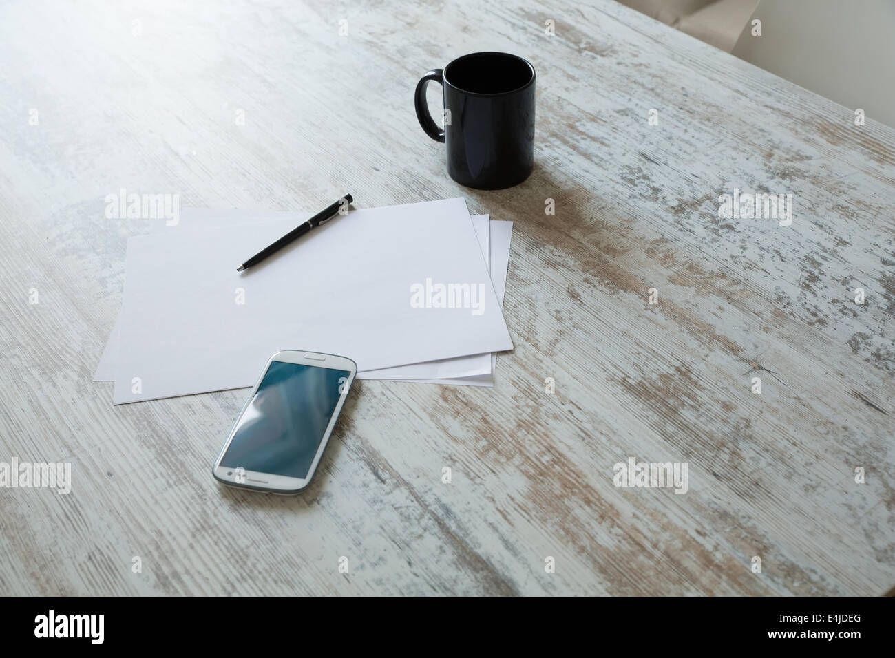 Brainstorming and taking notes at the table Stock Photo - Alamy